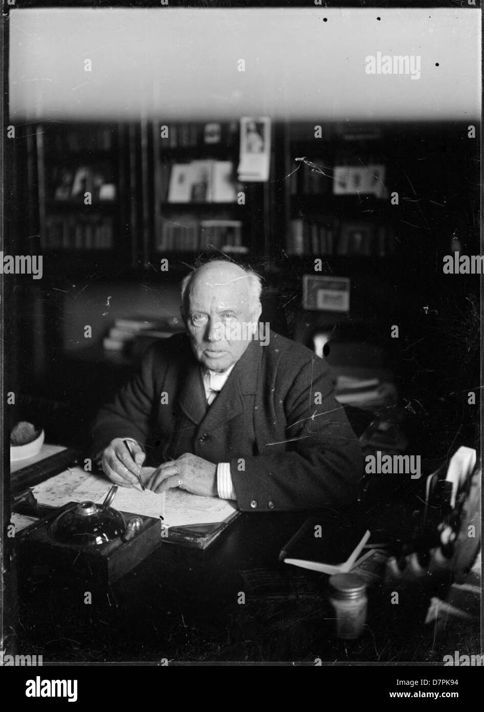 This photograph, housed in the Powerhouse Museum, depicts a man working ...