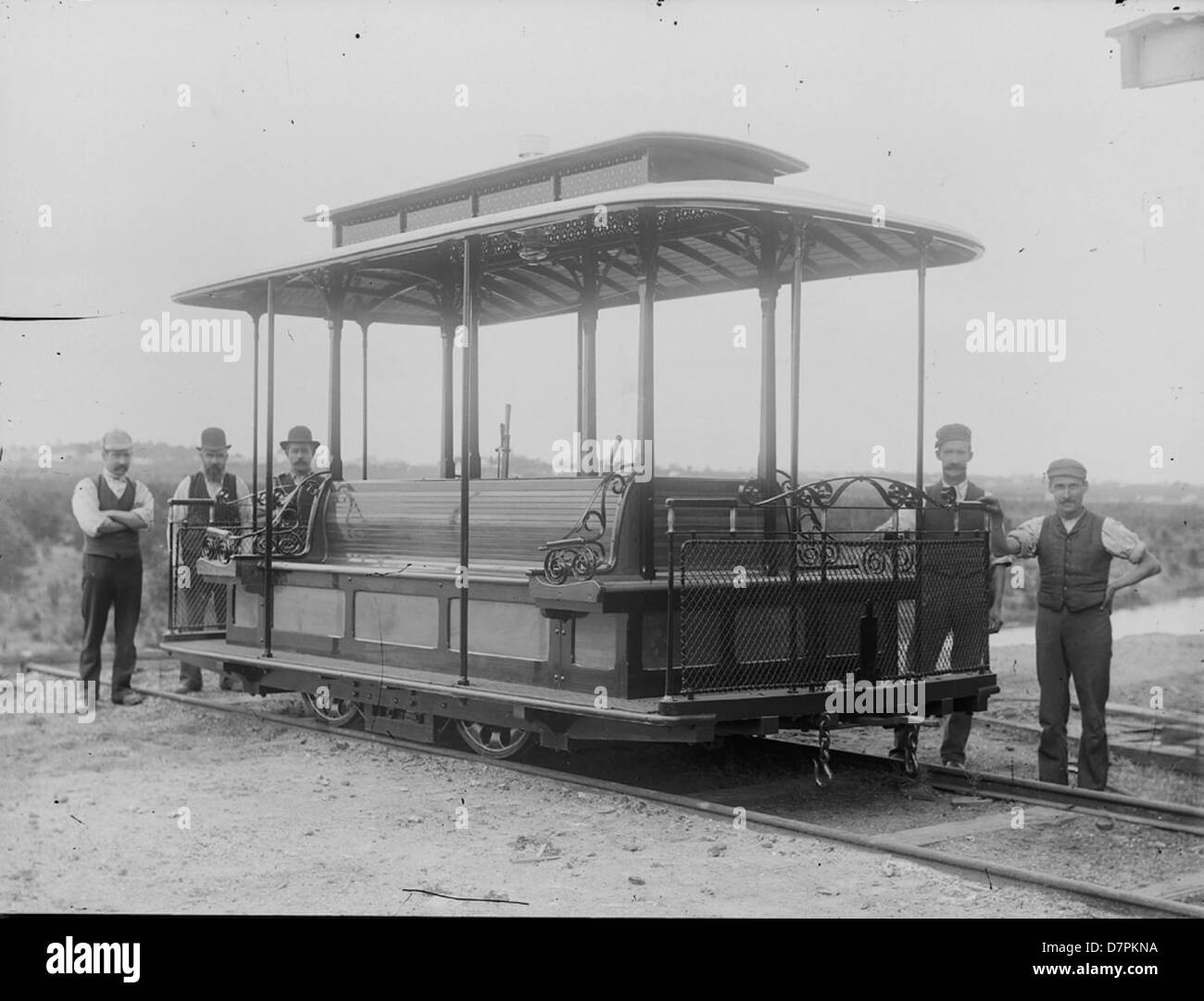 A historical image featuring workmen with a tram dummy van. This ...