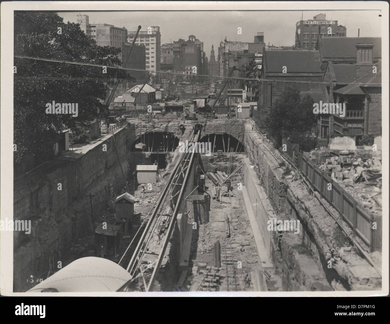 The Sydney Harbour Bridge construction image showcases the engineering ...