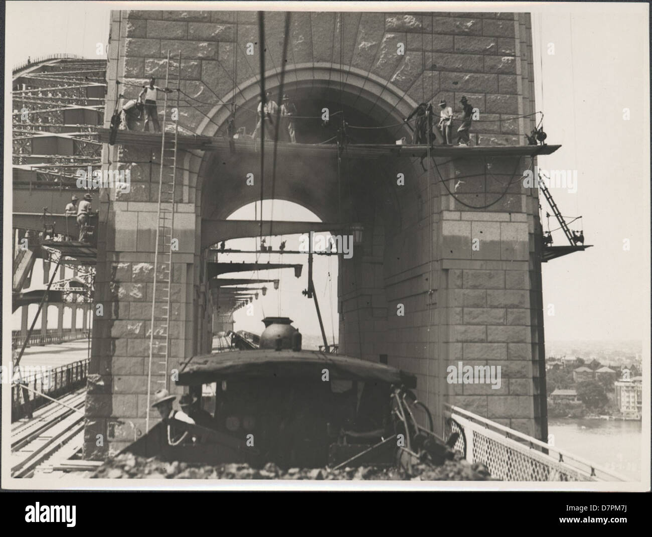 The construction of the Sydney Harbour Bridge, an iconic structure in ...