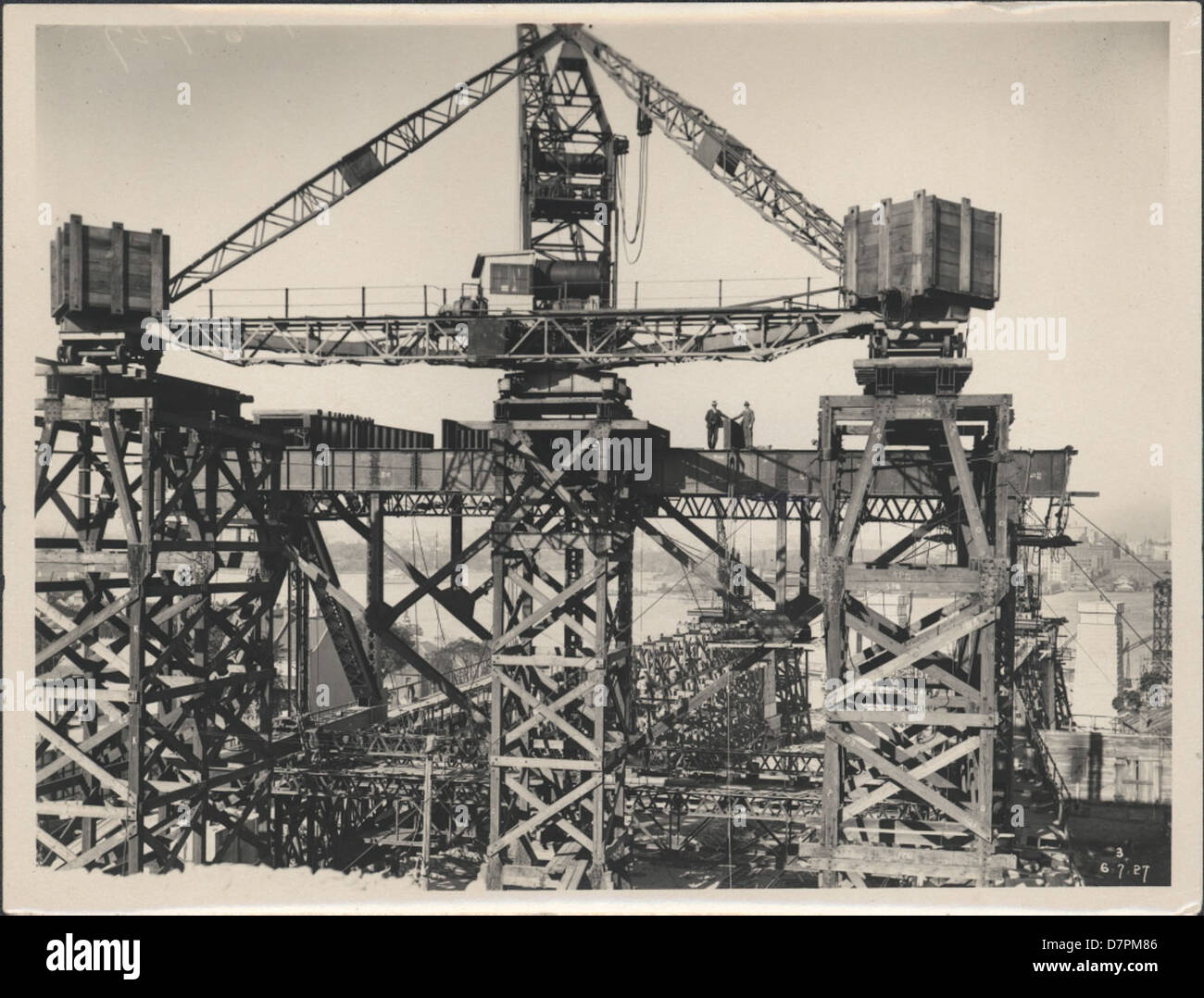 The Sydney Harbour Bridge construction, which began in 1924 and ...