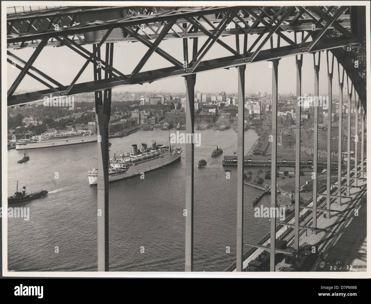 A historic photograph capturing the construction of the Sydney Harbour ...