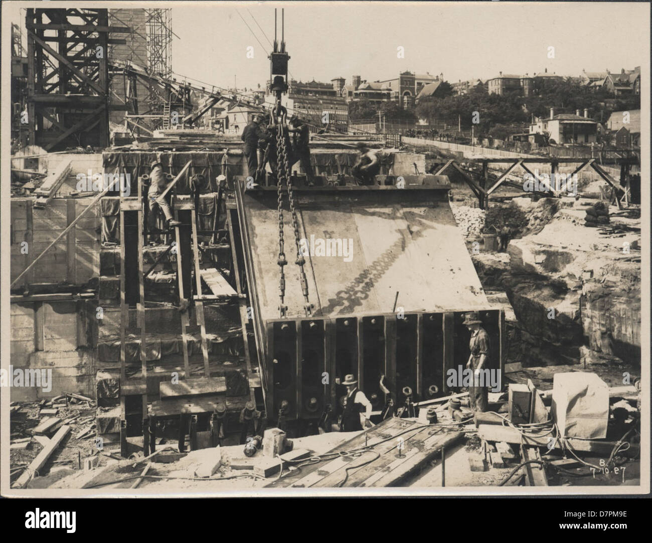 This image depicts the construction of the Sydney Harbour Bridge, one ...