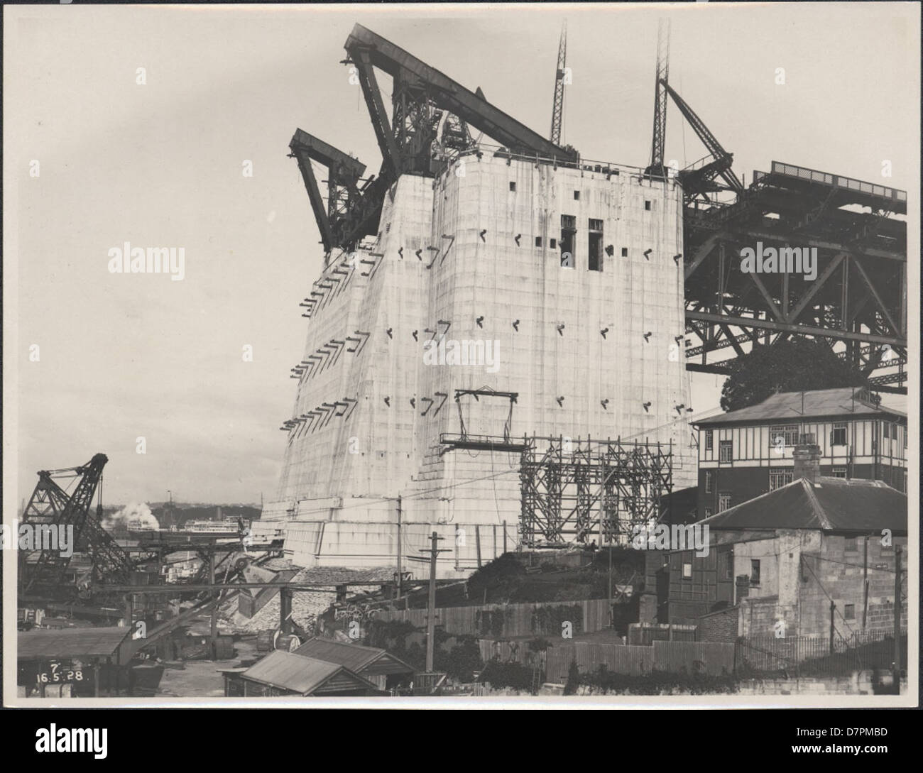 A historic photograph showing the construction of the Sydney Harbour ...