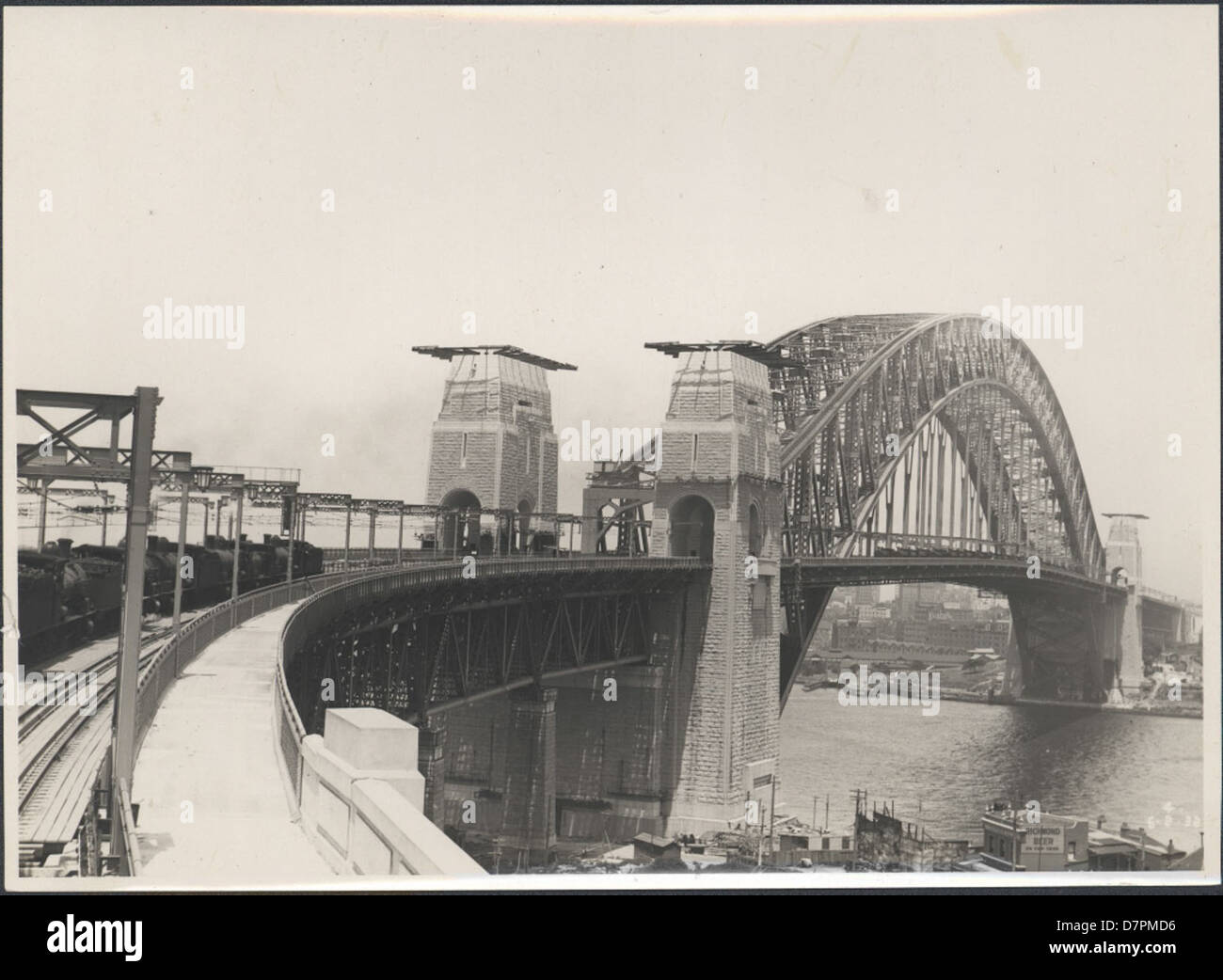This historical photograph captures the construction of the Sydney ...