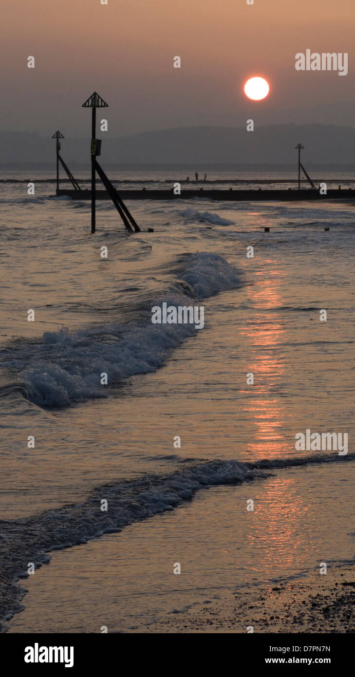 Sunset over the beach at Exmouth Stock Photo - Alamy