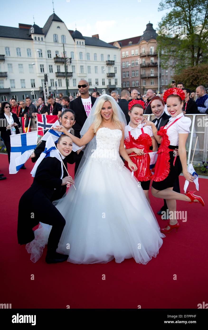 Singer Krista Siegfrids representing Finland comes along the red carpet ...