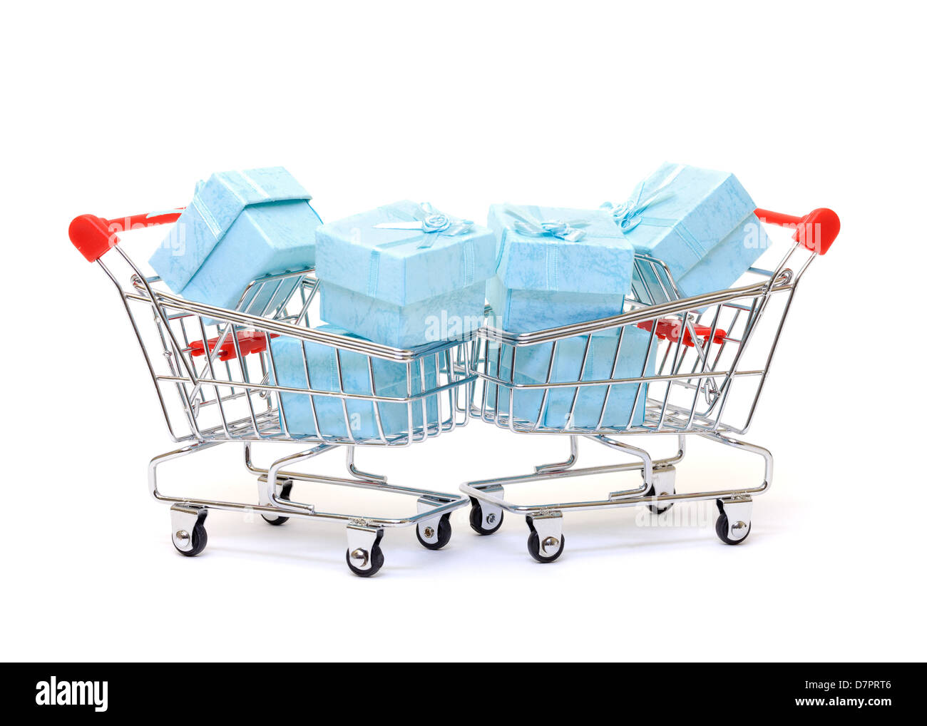 Cyan gift boxes in shopping carts on white background Stock Photo - Alamy