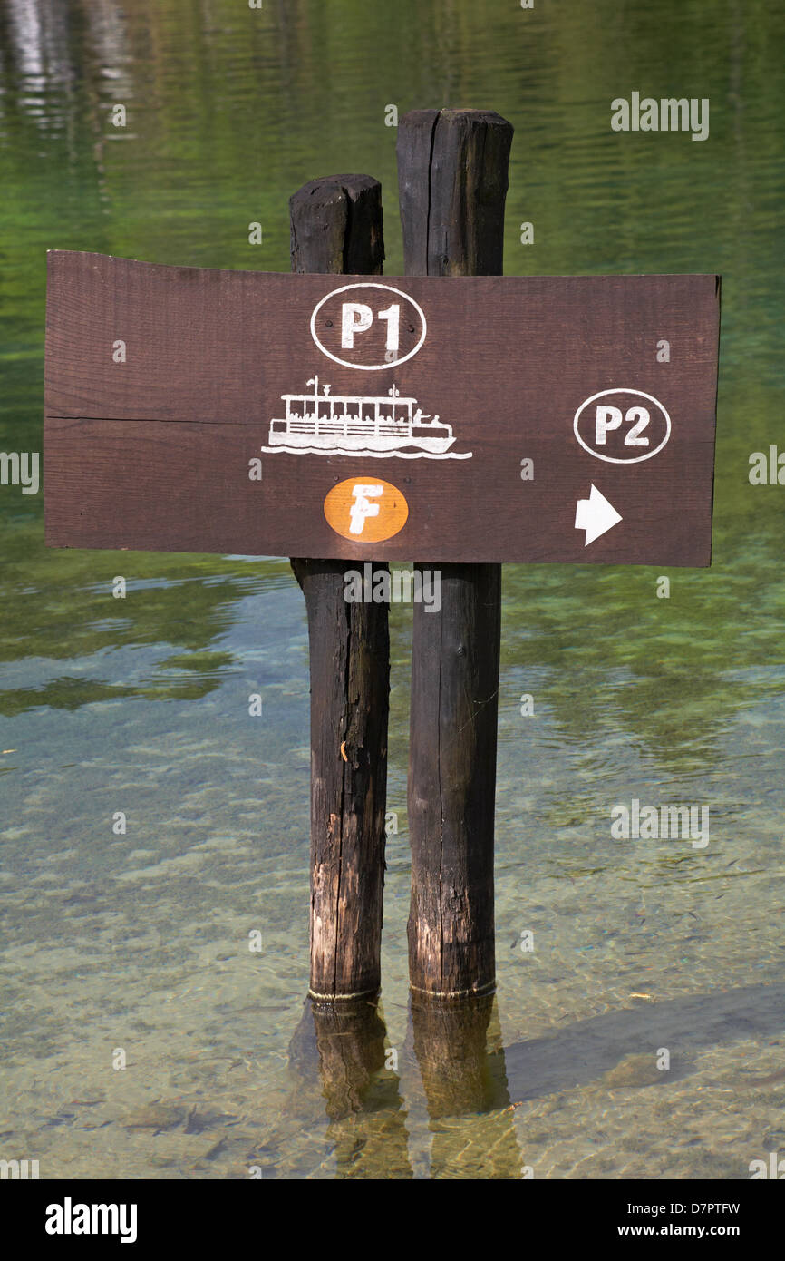 Sign directing to the boat station in the National Park Plitvice Lakes ...