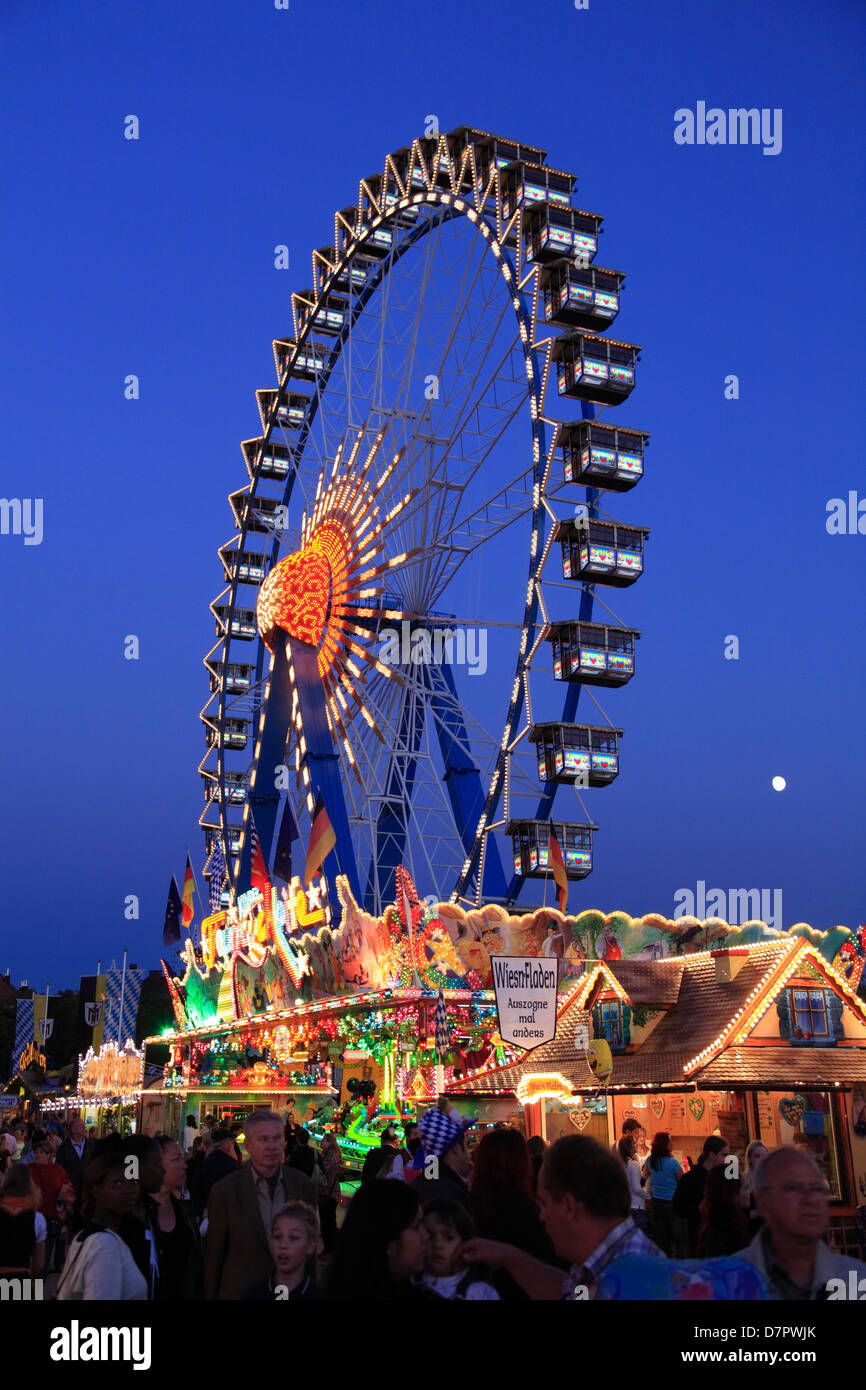 Oktoberfest, ferris wheel in the evening at Theresienwiese fairground ...