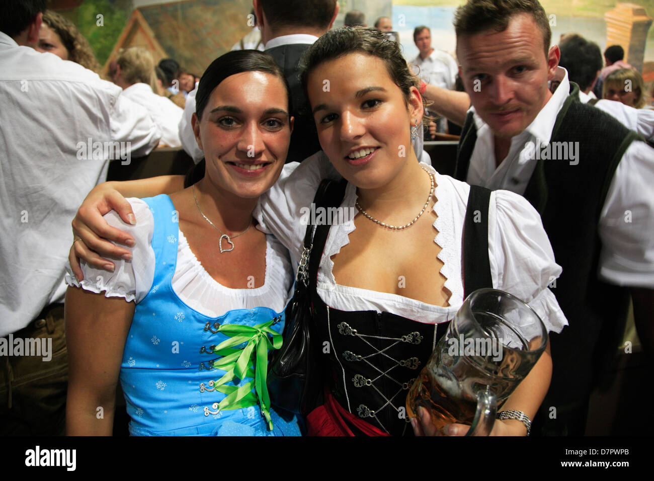 Oktoberfest Girls In Dirndls Oktoberfest Girl Holds Beer Glass And