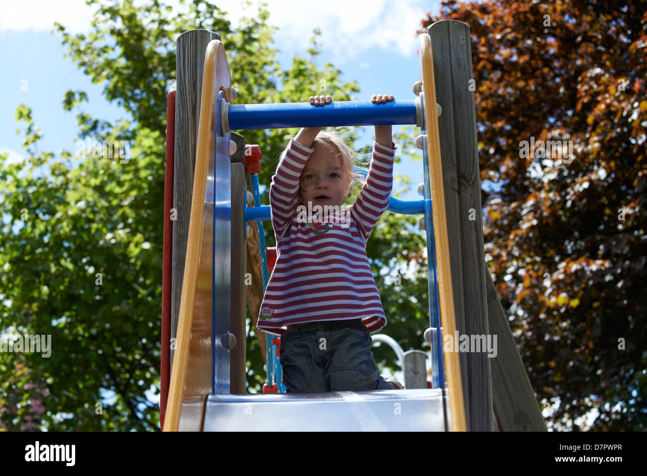 Blonde girl on slide hi-res stock photography and images - Alamy