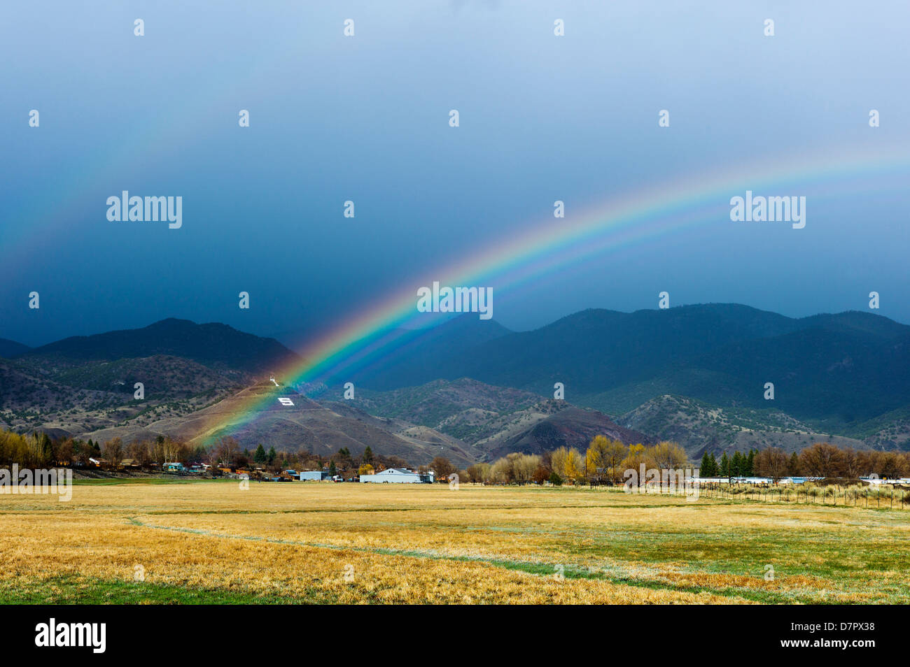 Rainbow over the small mountain town of Salida, Colorado, USA Stock ...