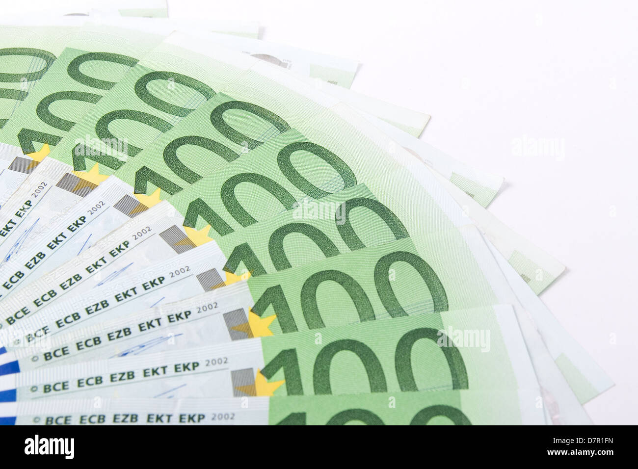 Close-up of 100 Euro banknotes isolated on white background Stock Photo ...