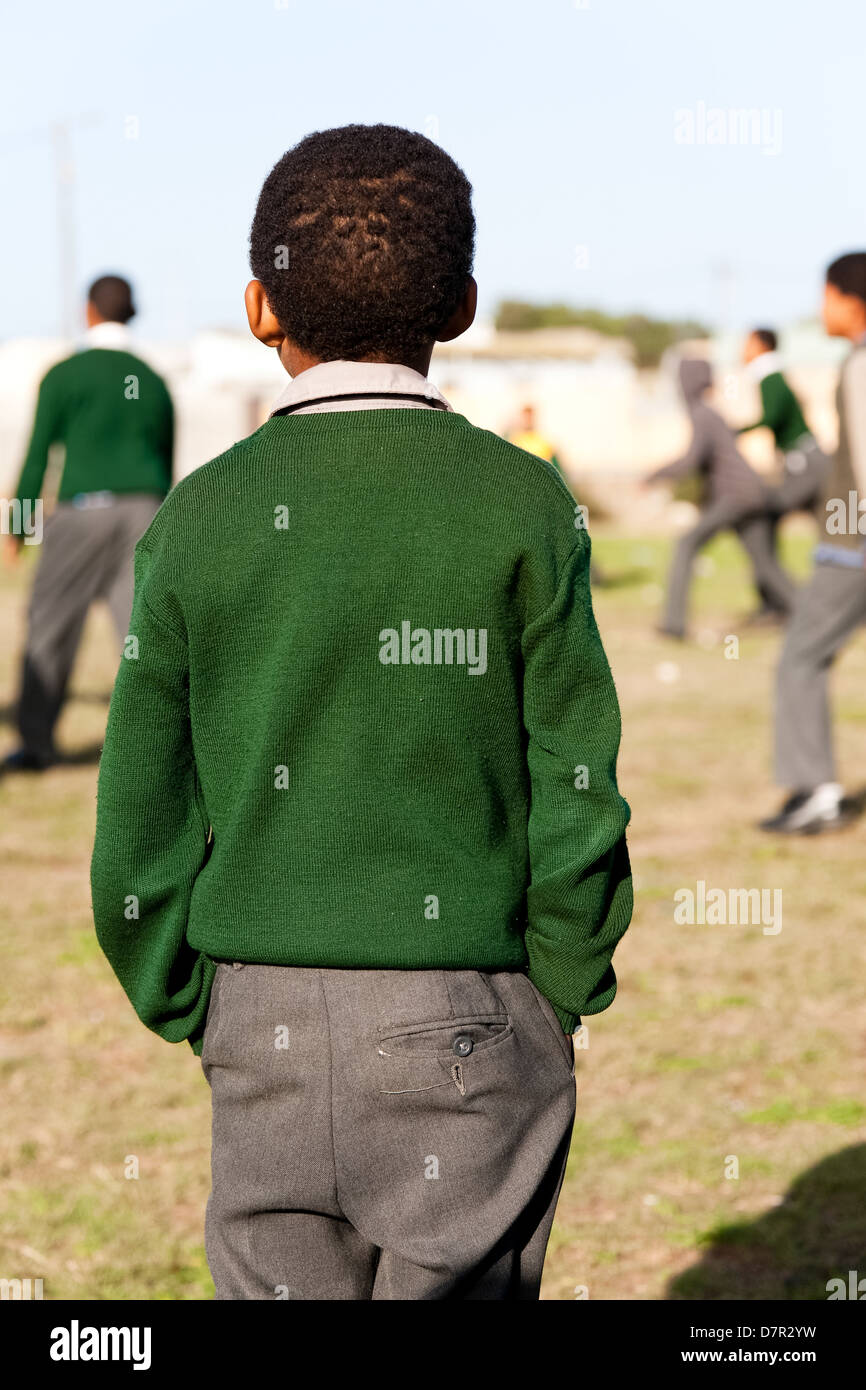 Boy from behind school uniform hi-res stock photography and images - Alamy