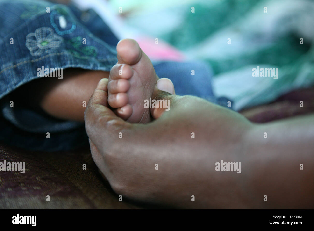 African baby feet hi-res stock photography and images - Alamy