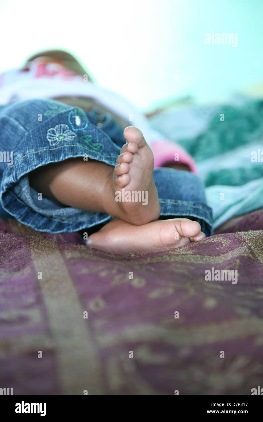 African baby feet hi-res stock photography and images - Alamy