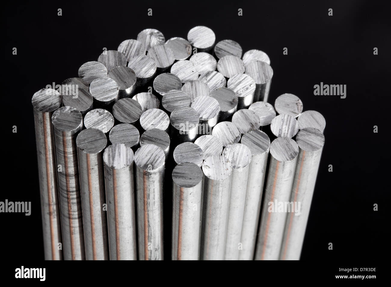 A stack of round bundled alumnium rods Stock Photo - Alamy
