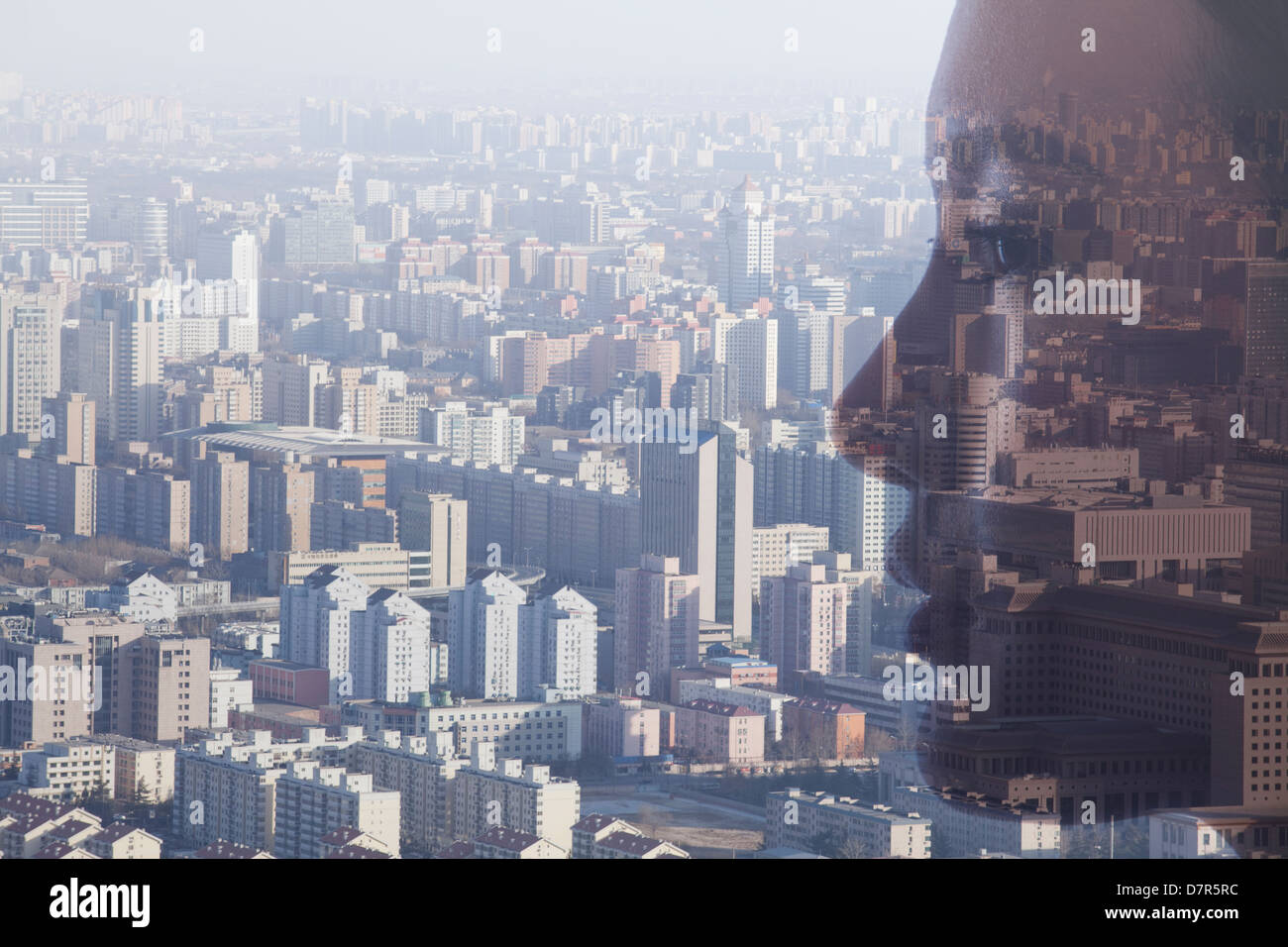 Double exposure of young woman's face over cityscape, side view Stock ...