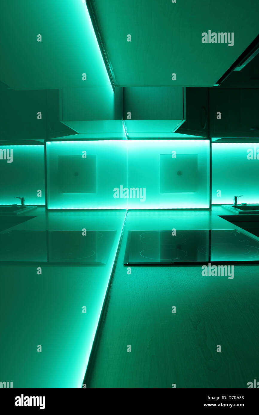 modern luxury kitchen with turquoise led lighting Stock Photo - Alamy