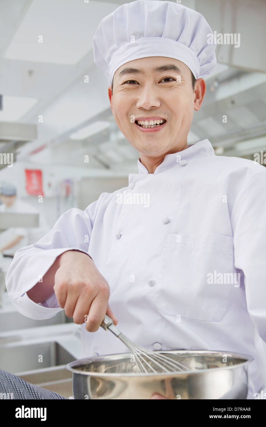 Portrait chef holding mixing bowl hi-res stock photography and images ...