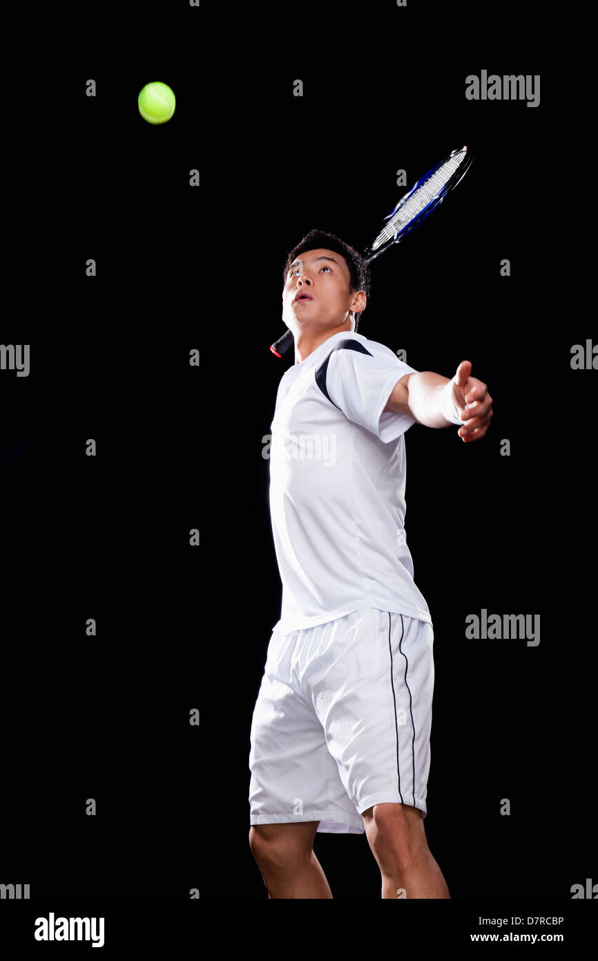 Tennis player ready to hit ball, portrait Stock Photo - Alamy