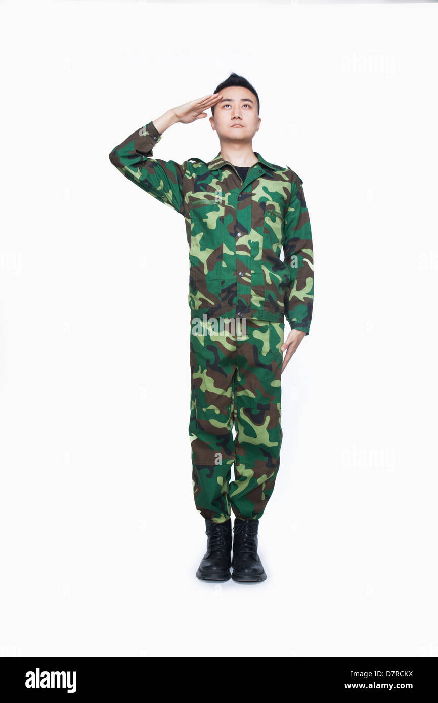 Man in military uniform standing Cut Out Stock Images & Pictures - Alamy