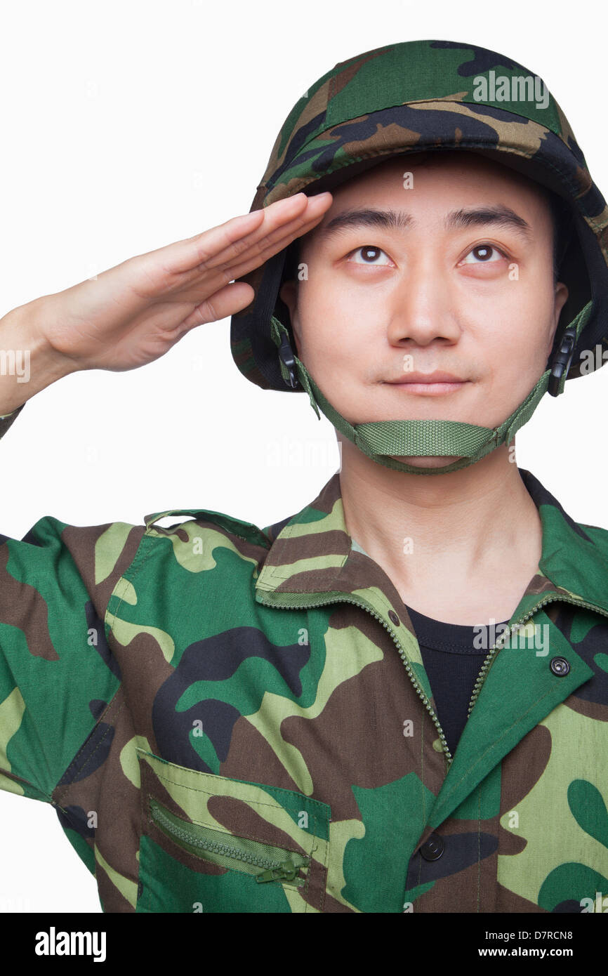 Man in military uniform saluting Stock Photo - Alamy