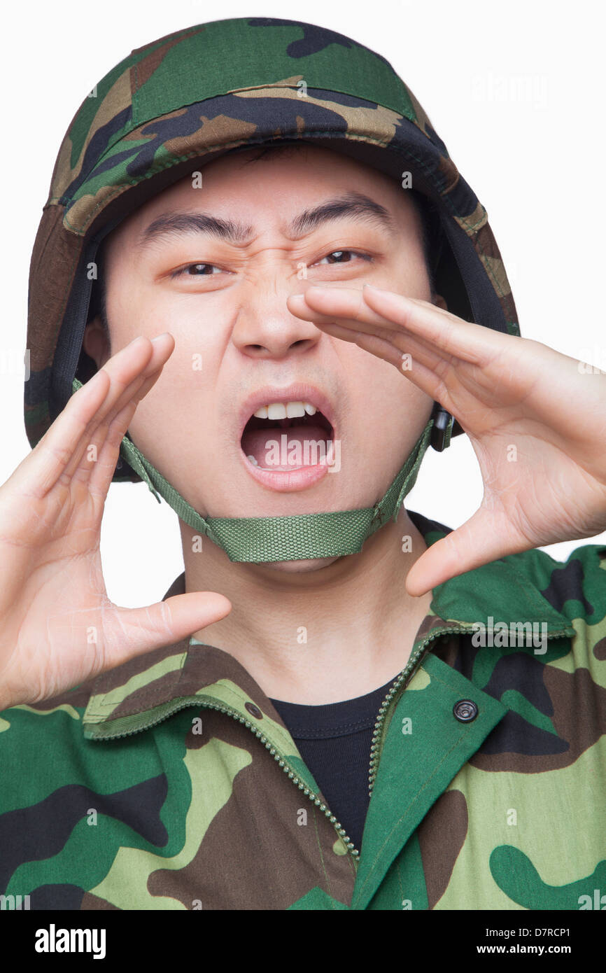 Man in military uniform shouting Stock Photo - Alamy