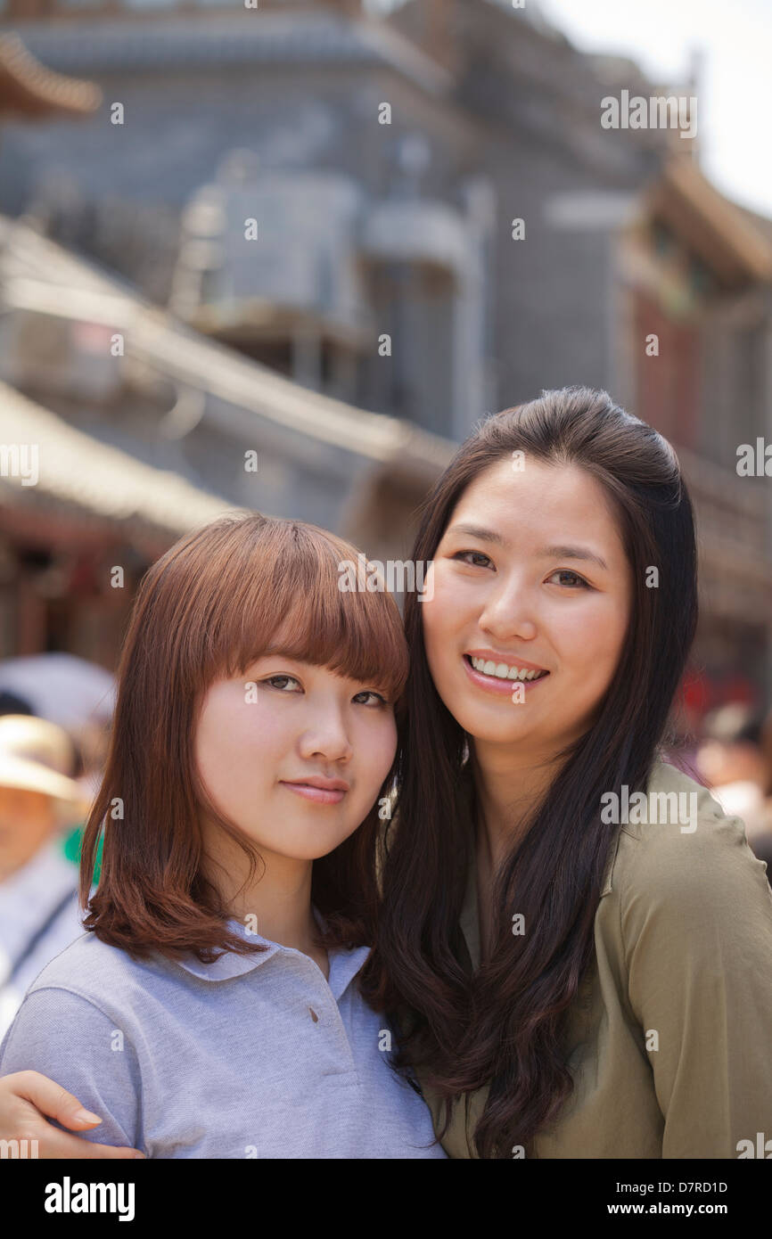 Portrait of two young girls in Beijing outdoors Stock Photo - Alamy