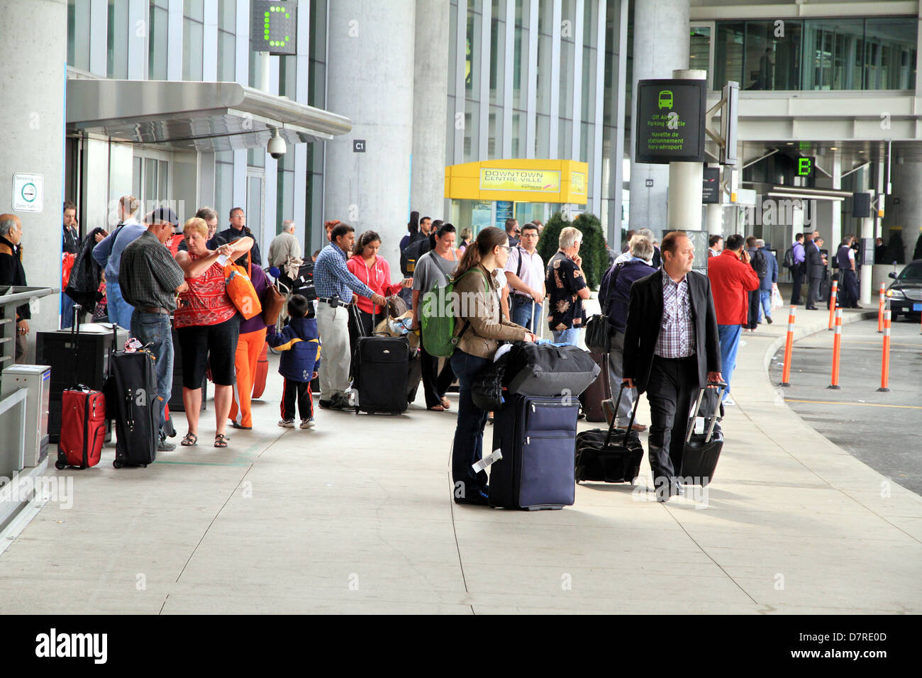 People Waiting at Toronto Pearson Airport Stock Photo - Alamy