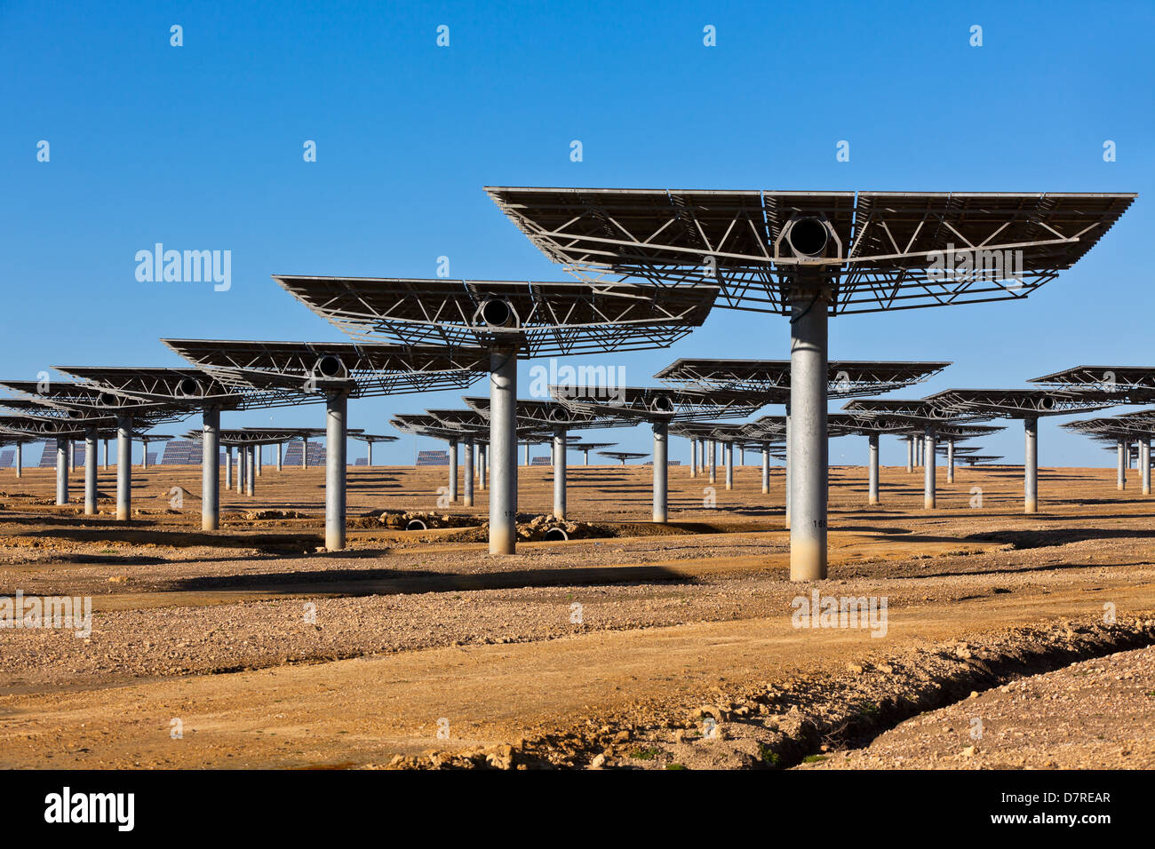Solar panels on bright blue sky background. Renewable Energy ...