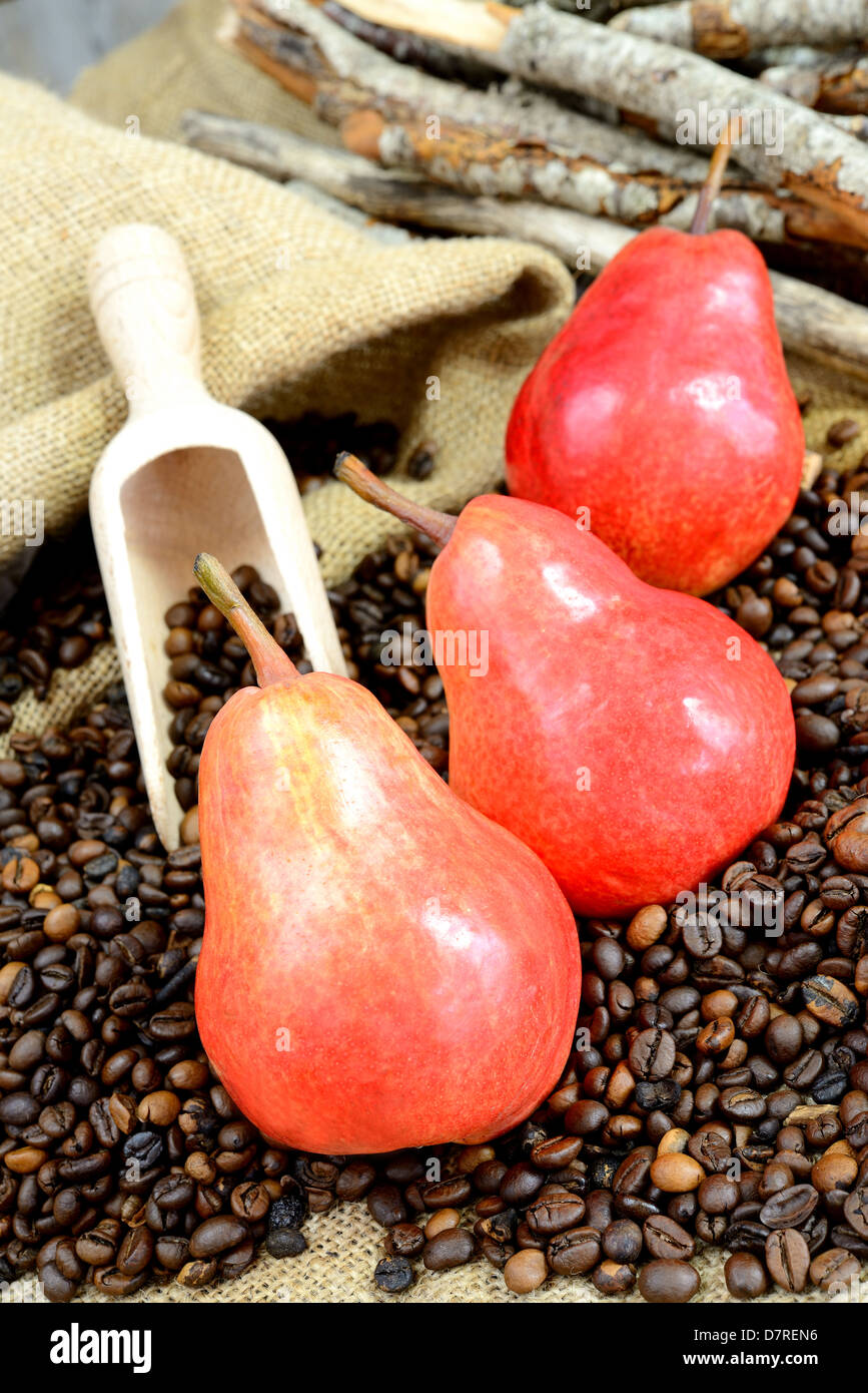 read sweet pears on dried wood and sack Stock Photo - Alamy
