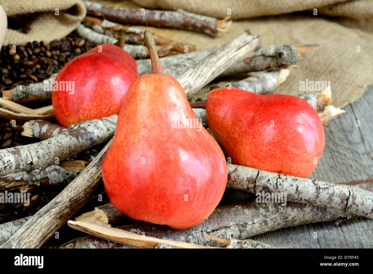 read sweet pears on dried wood and sack Stock Photo - Alamy