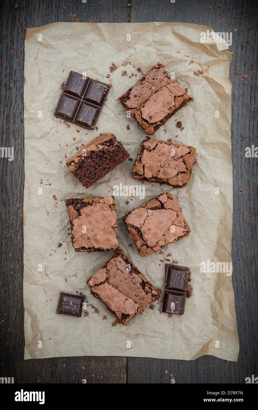 Chocolate brownies on greaseproof paper Stock Photo - Alamy