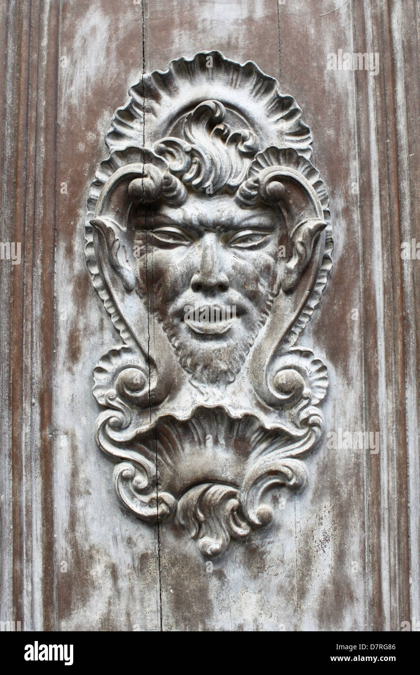 Vintage face on old door hi-res stock photography and images - Alamy
