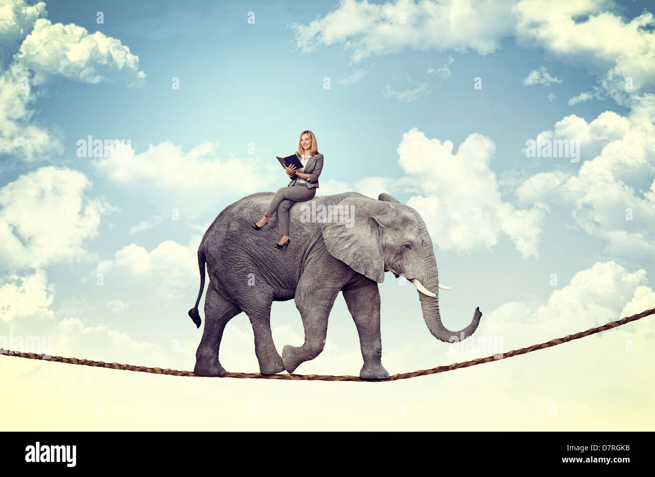 smiling woman on acrobat elephant Stock Photo - Alamy