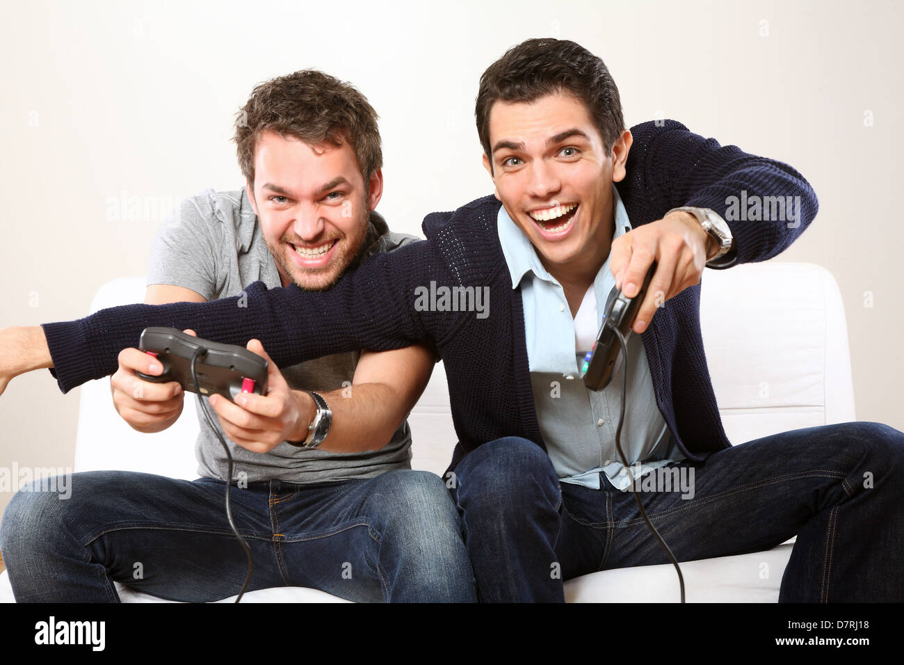 two man play with computer Stock Photo - Alamy