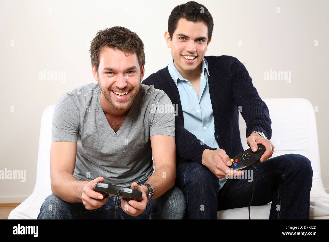 two man play with computer Stock Photo - Alamy