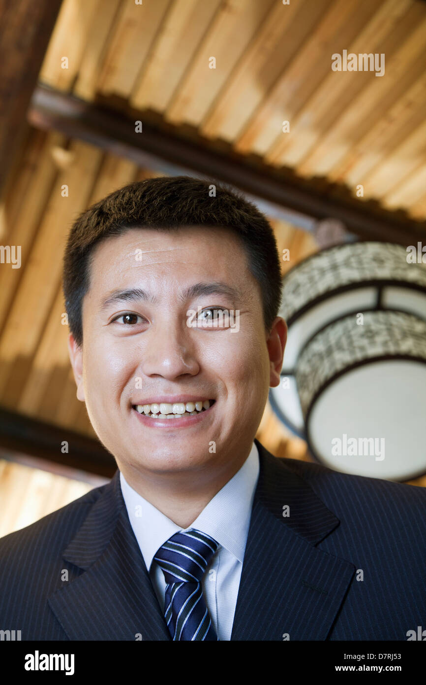 Low Angle Portrait of a Businessman Stock Photo - Alamy