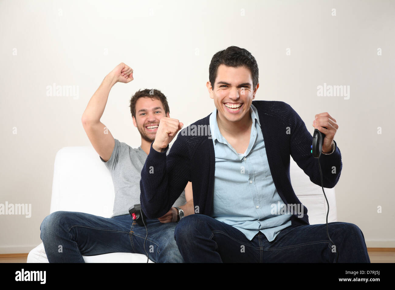 two man play with computer Stock Photo - Alamy