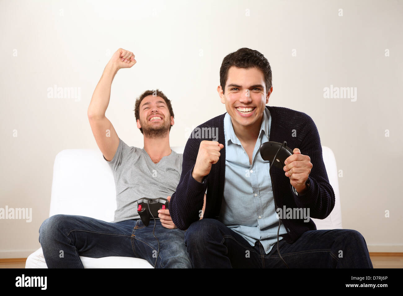 two man play with computer Stock Photo - Alamy