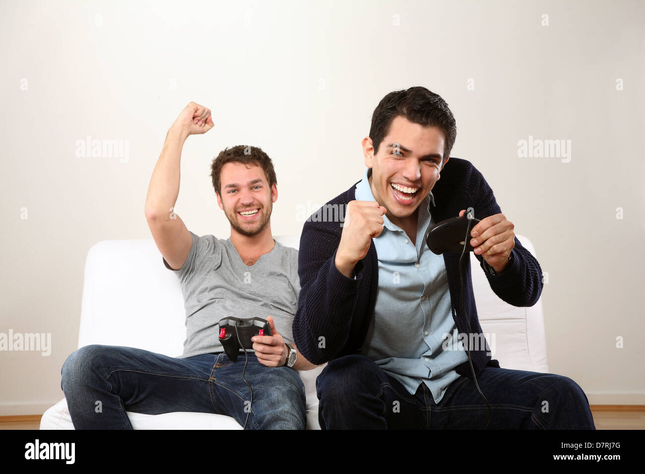 two man play with computer Stock Photo - Alamy
