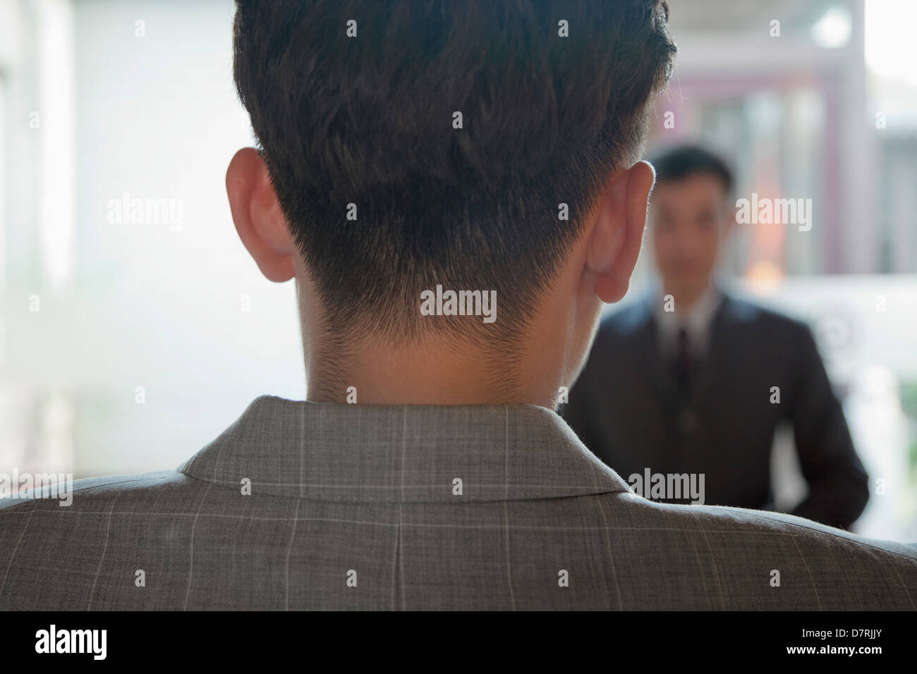 Back of Businessman's Head Stock Photo - Alamy