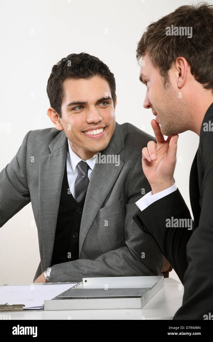 two man explaining Stock Photo - Alamy