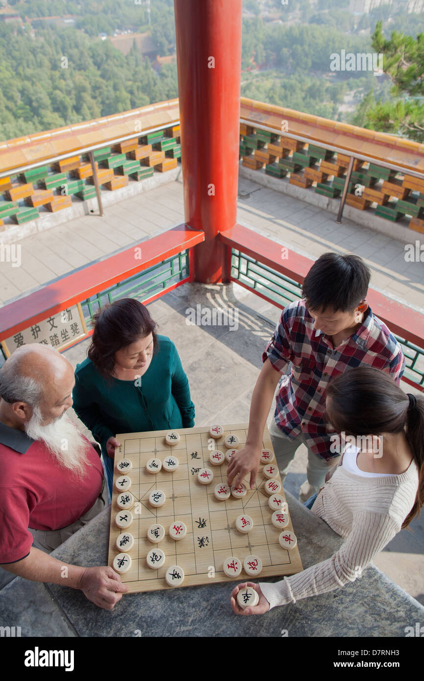 Chinese Family Playing Chinese Chess (Xiang Qi Stock Photo - Alamy