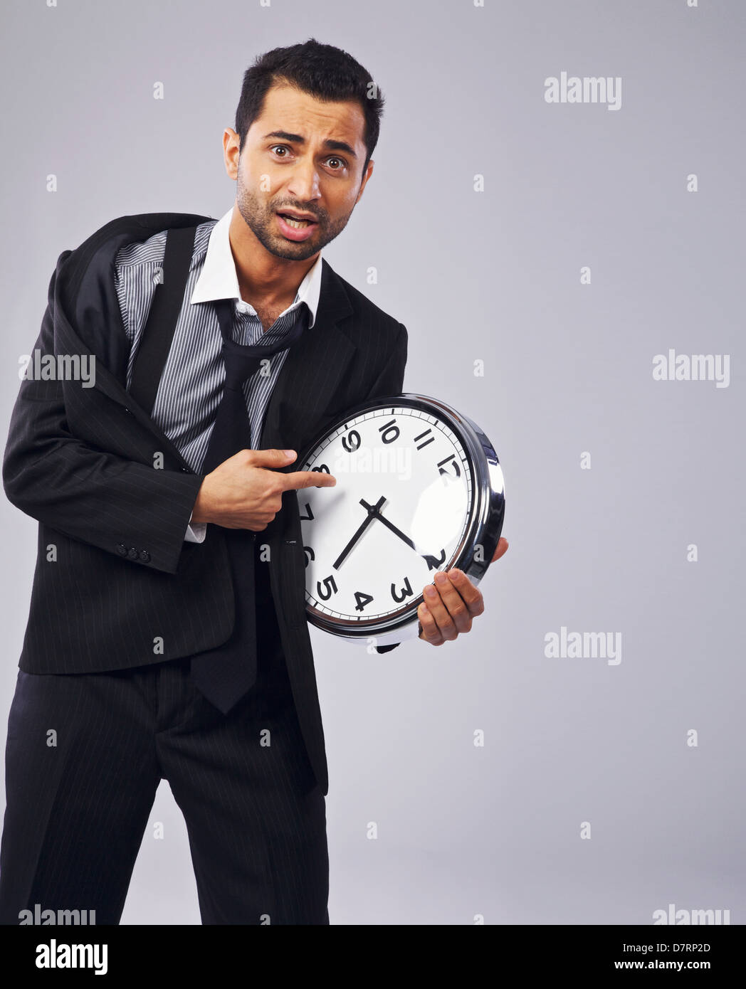 Worried man and clock hi-res stock photography and images - Alamy