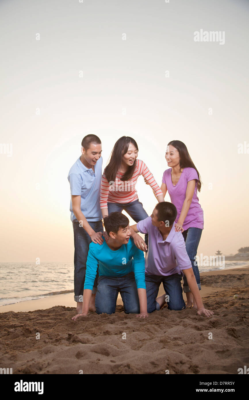 Human pyramid beach hi-res stock photography and images - Alamy