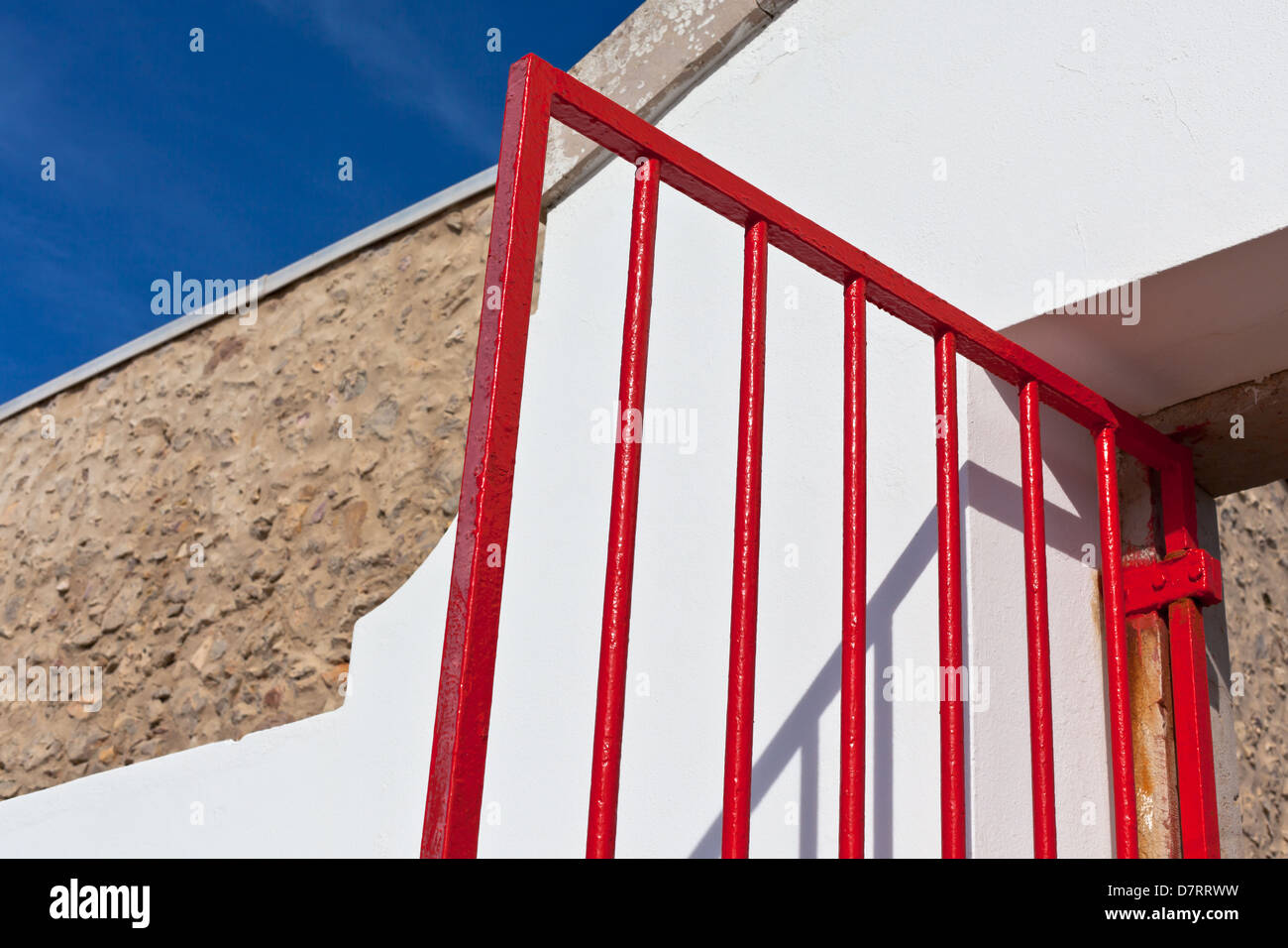 Bright Red Metal Door at White House and Blue Sky Background Stock ...