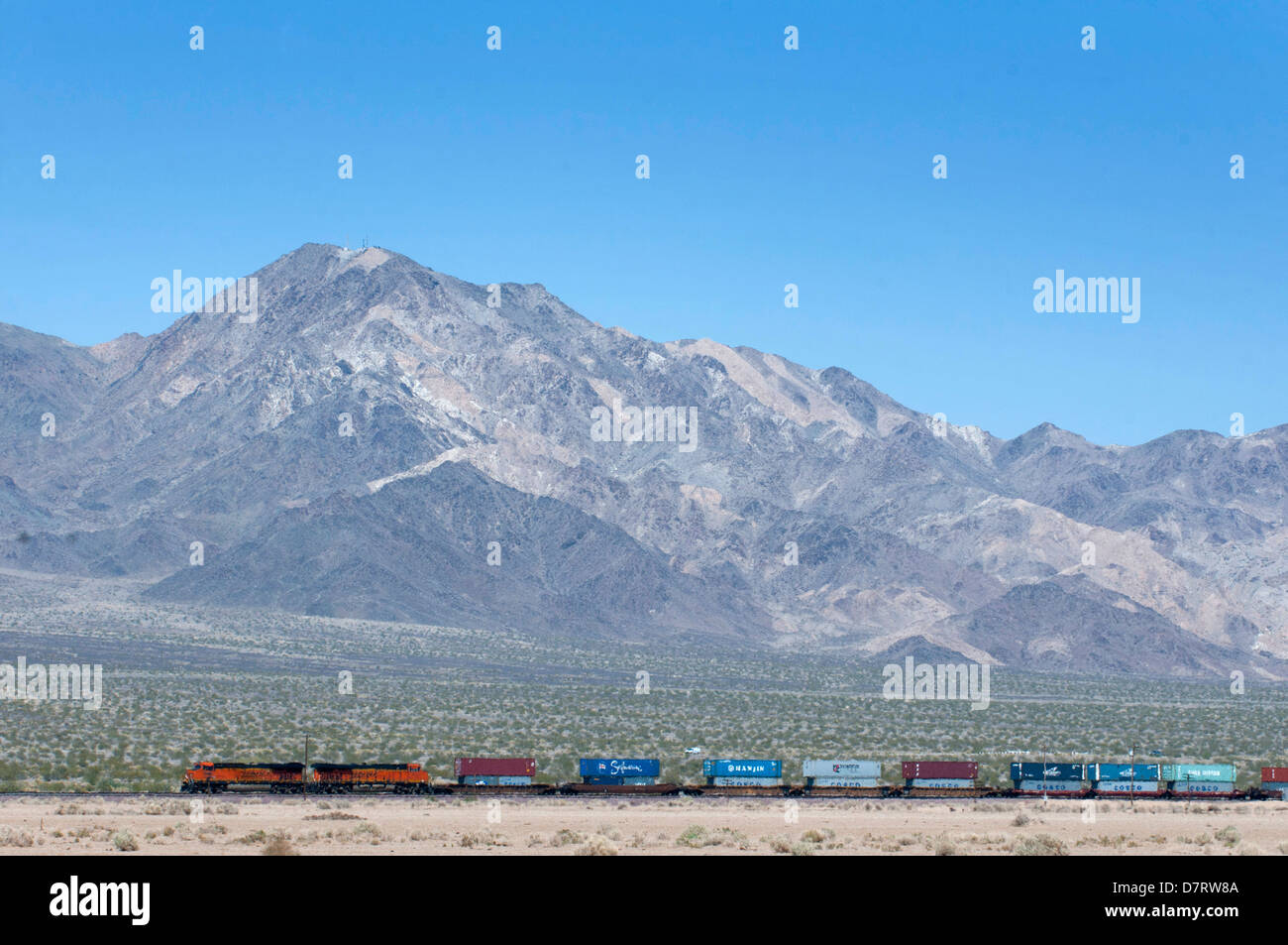 A train from the BNSF Railway line travelling through California's Mojave Desert, near the town ...